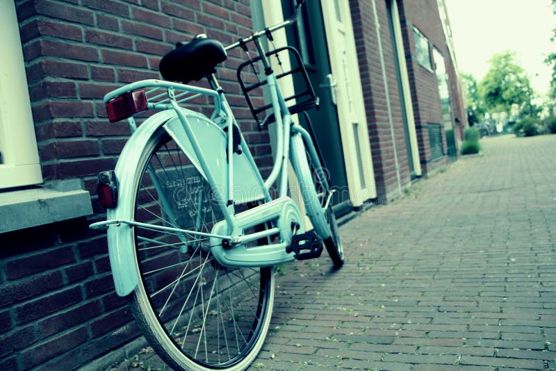 Blue Bike. City-bicycle Parked Near Dutch House. Stock Photo - Image of ...