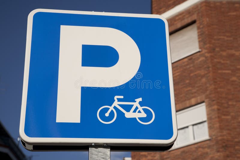 Blue Bike Parking Sign stock photo. Image of bike, health - 14688400