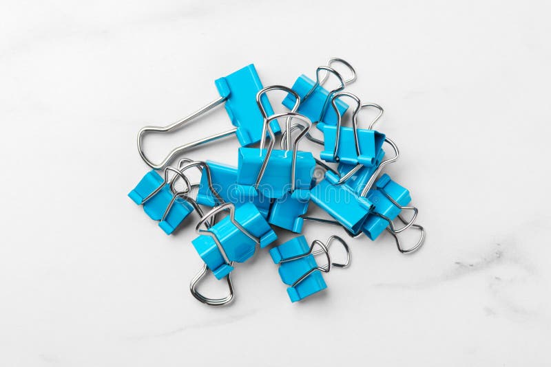 Blue Binder Paper Clips on Marble Table Background Stock Photo - Image ...