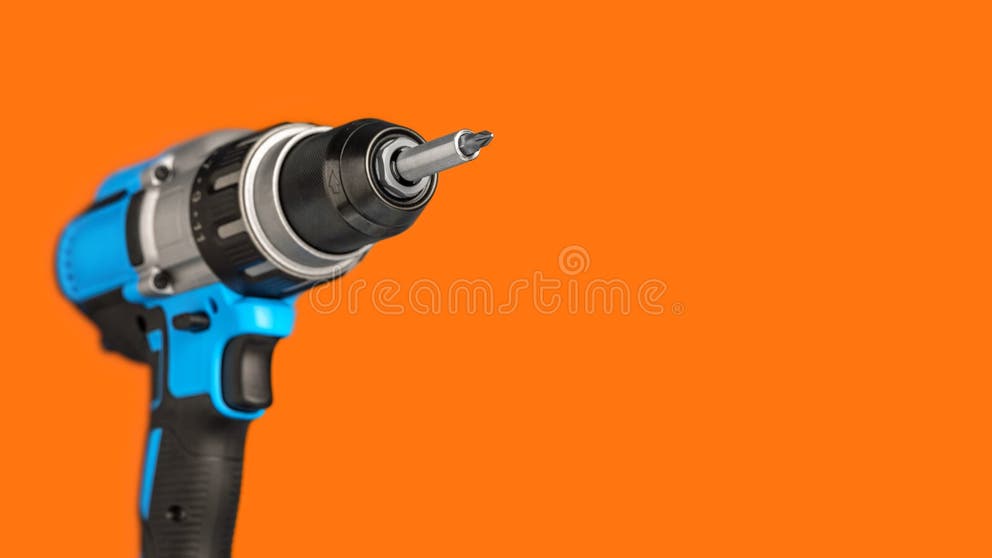 Blue-black Cordless Combi Drill on Orange Background Stock Image ...