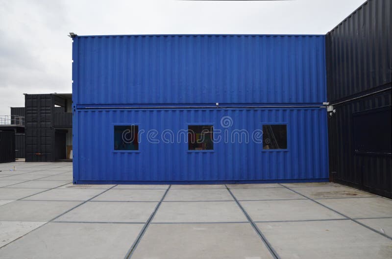 Blue and Black Painted Containers in the Harbor of Antwerpen Stock ...