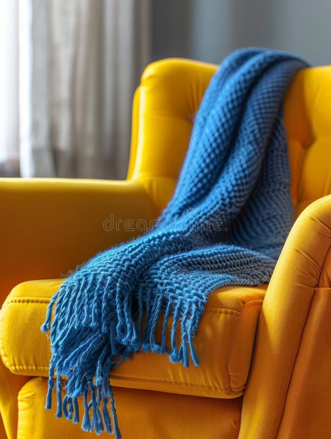 Blue Blanket Draped Over Bright Yellow Chair Stock Photos - Free ...