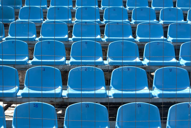 Blue bleachers stock image. Image of chair, arenas, reserved - 75082729