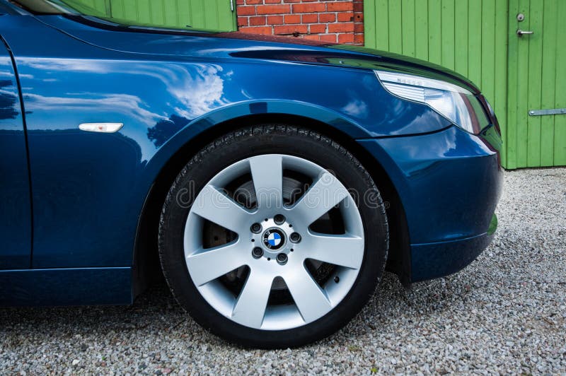 Blue BMW E60 545 i editorial stock image. Image of clouds - 57671209