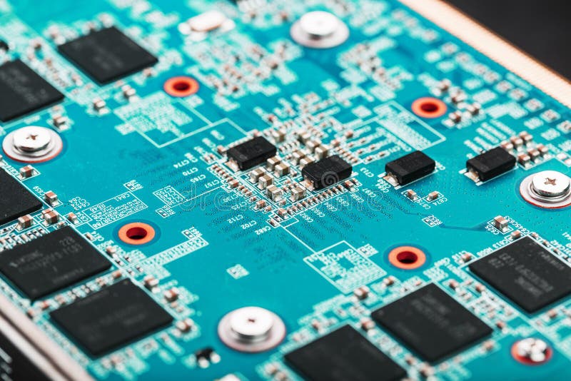 A Blue Board with Chips and a Gaming Graphics Card Processor. Stock ...