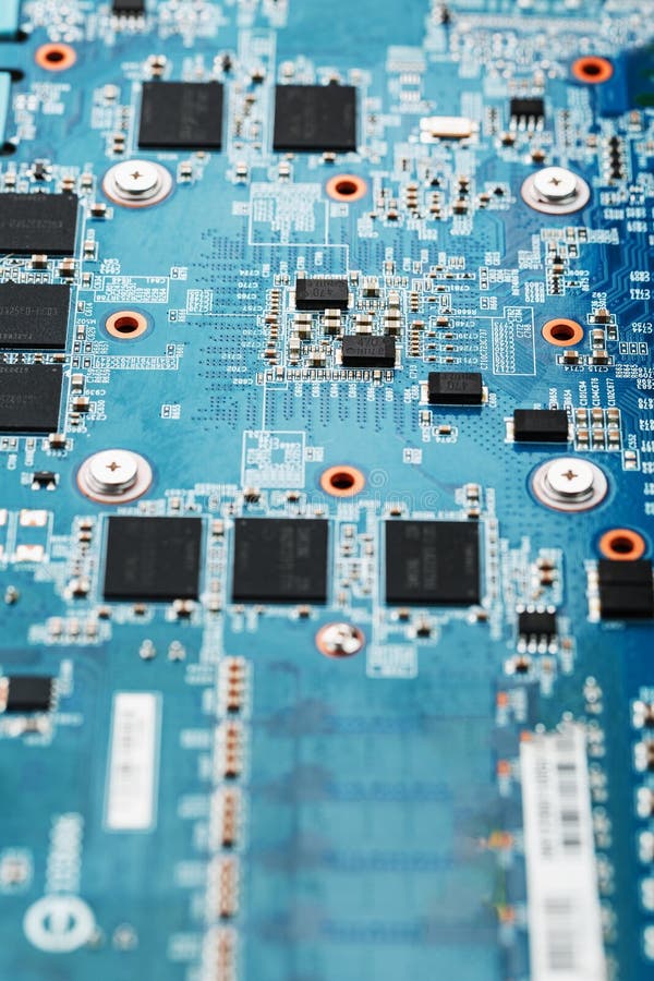 A Blue Board with Chips and a Gaming Graphics Card Processor. Stock ...