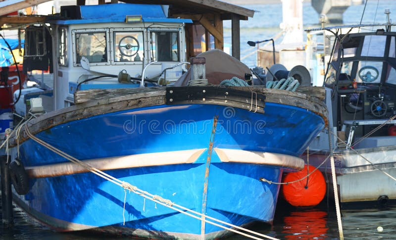 The Blue Boat stock photo. Image of ships, rope, harbor - 254134854