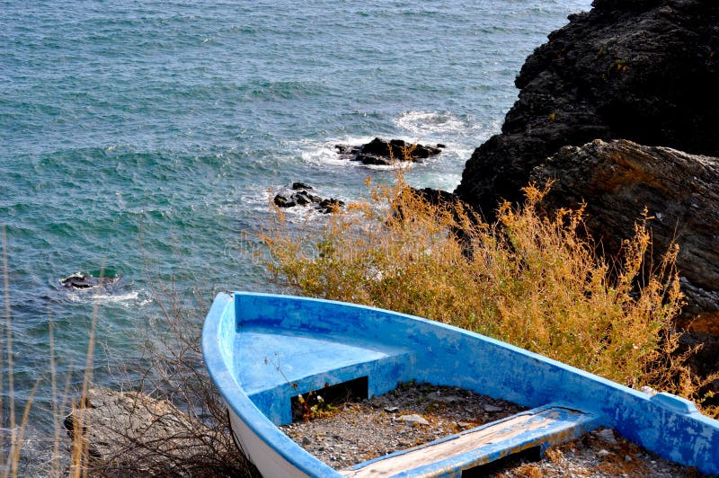 Blue boat stranded stock image. Image of coast, aground - 86190655
