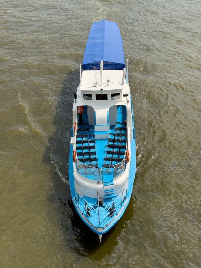 A Blue Boat with a Blue Top is on the Water Stock Image - Image of view ...