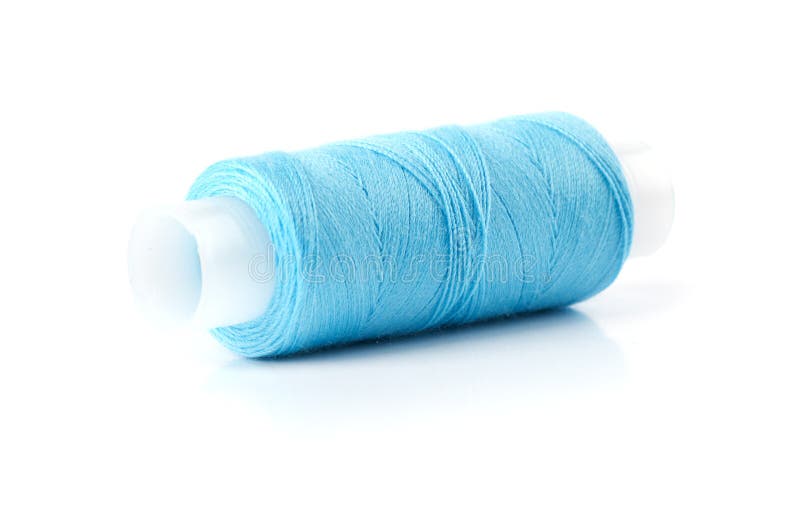 Blue bobbin thread stock photo. Image of macro, clothes - 24090018