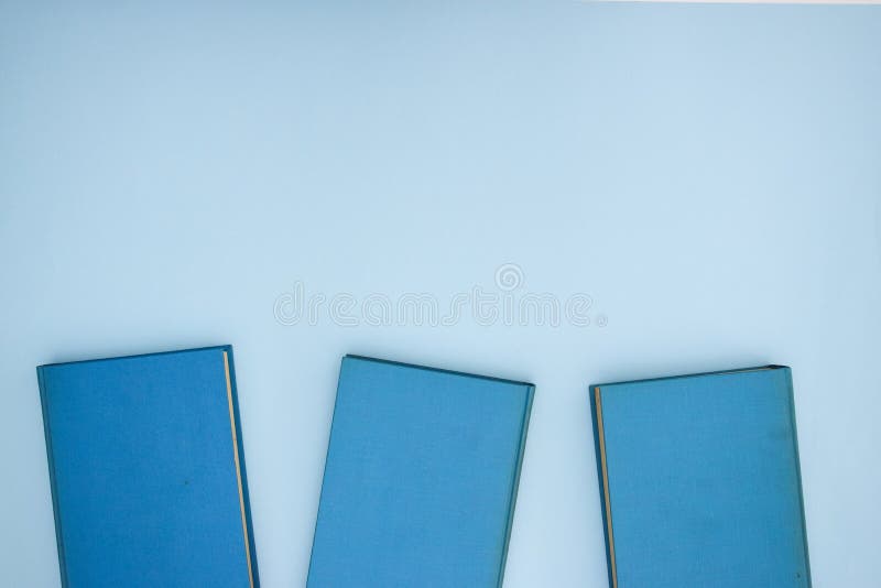 Blue Books on Blue Background Stock Image - Image of phone, read: 143833069