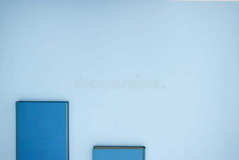 Blue Books on Blue Background Stock Image - Image of phone, black ...