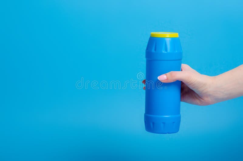 Blue Bottle Detergent Powder in Hand Stock Image - Image of isolate ...