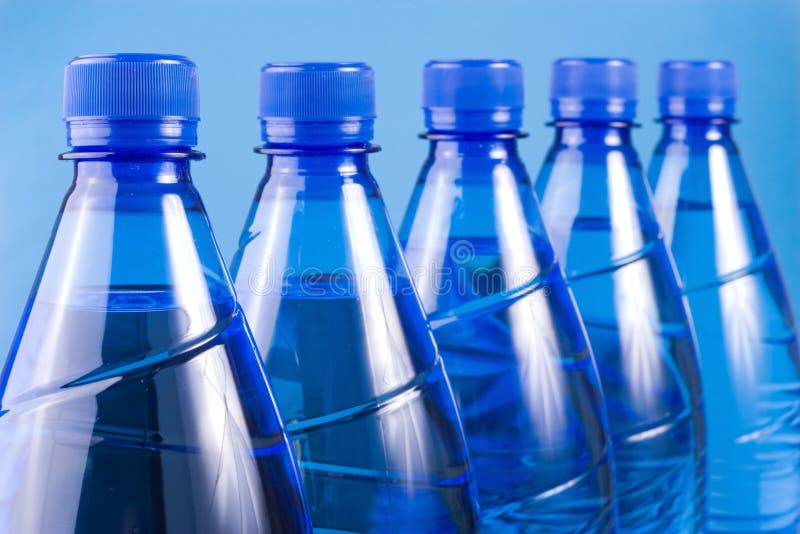 Blue bottles stock image. Image of liquid, thirst, blue - 3873287