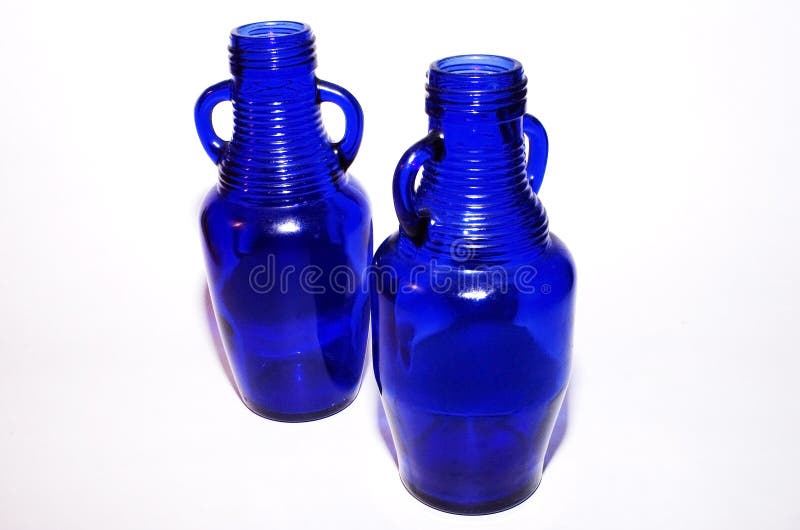 Blue Bottles stock image. Image of shadow, glass, container - 735869