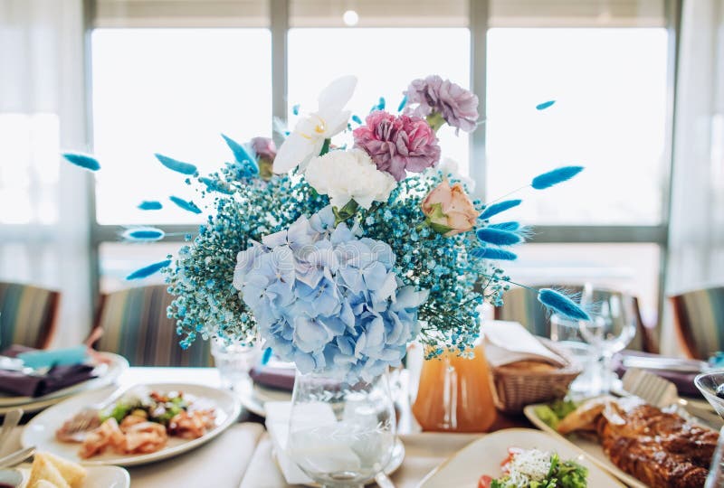 Bouquet with Fresh Flowers on the Table in Restaurant Stock Image ...