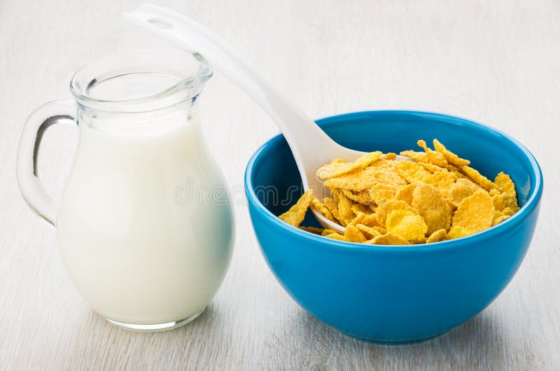 Blue Bowl with Corn Flakes and Jug of Milk Stock Image - Image of blue ...