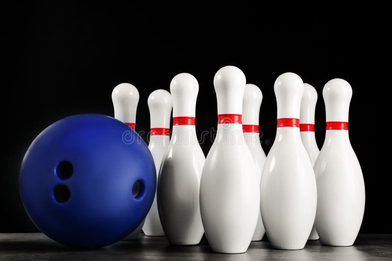 Blue Bowling Ball and Pins on Stone Table Stock Photo - Image of relax ...