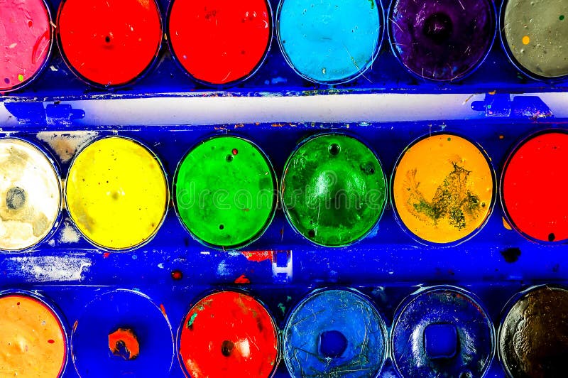 A Blue Box with Many Different Colored Paint Tubes Inside Stock Photo ...