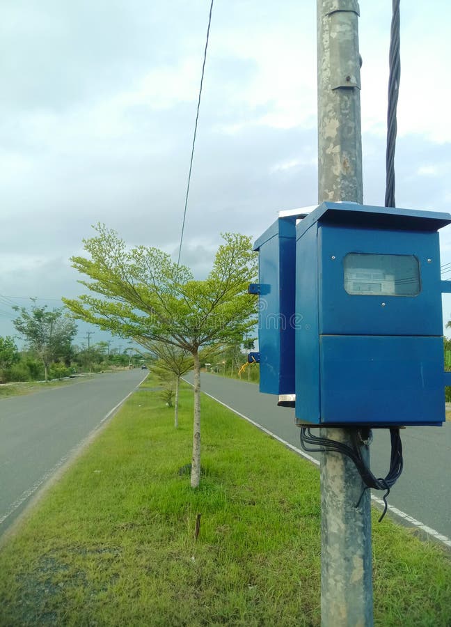 Blue Box in the Middle of a Two-way Street Stock Photo - Image of ...