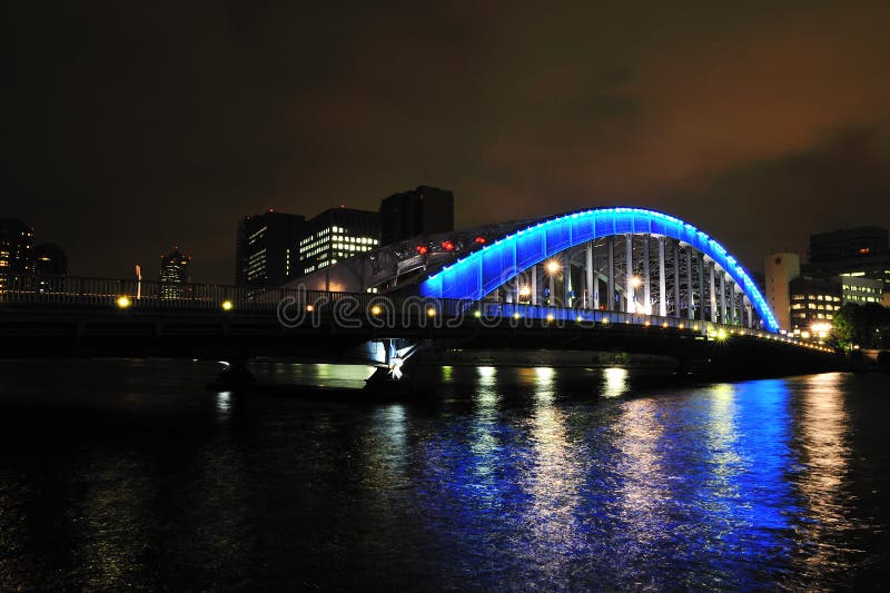 Blue bridge at night stock photo. Image of buildings - 10472364