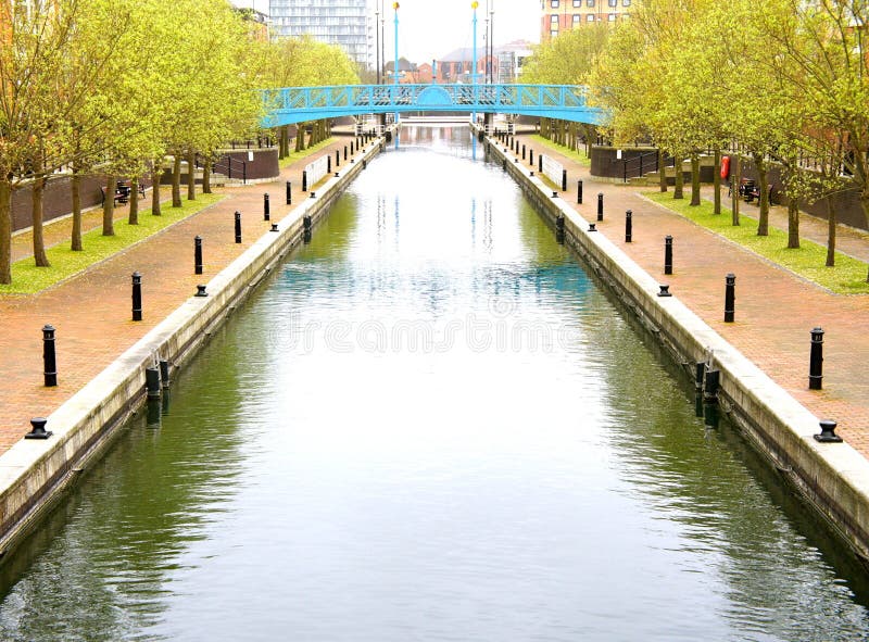 Blue Bridge Over Beautiful Water Stock Photo - Image of quays, calm ...