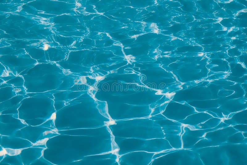 Blue and Bright Ripple Water Surface in Swimming Pool with Sun ...