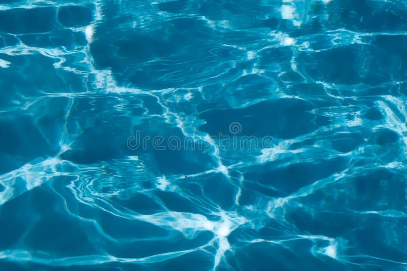 Blue and Bright Ripple Water Surface in Swimming Pool with Sun ...