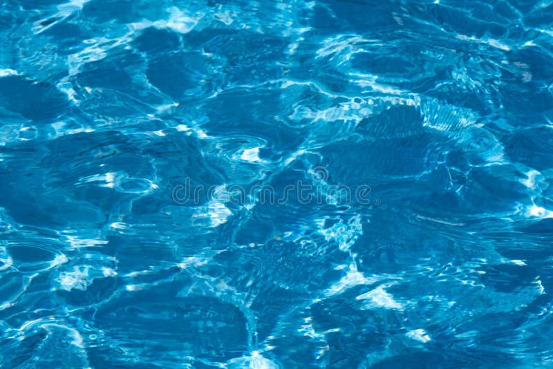 Blue and Bright Ripple Water Surface in Swimming Pool with Sun ...