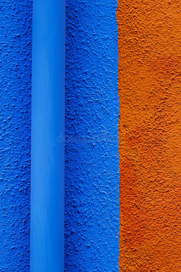Blue and Brown Wall of Two Houses with Blue Gutter Pipe Stock Photo ...