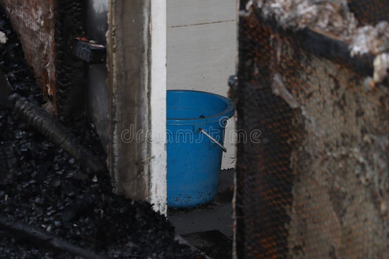 Blue Plastic Bucket Survives Building Fire Stock Photo - Image of ...