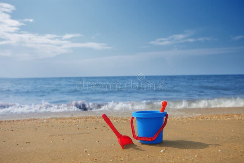 Blue Bucket on beach stock image. Image of bucket, plastic - 36722185
