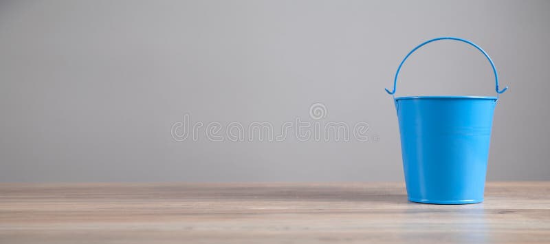 Blue Bucket on the Desk. Space for Your Text Stock Image - Image of ...