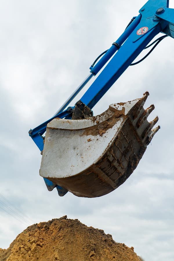 Blue Bucket Excavator Close Up Stock Image - Image of soil ...