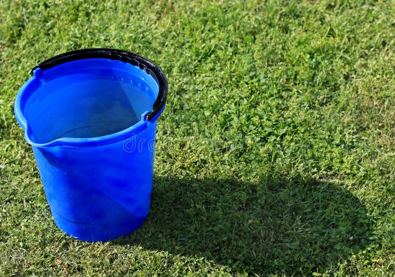 Water full plastic bucket stock image. Image of cold - 17500481