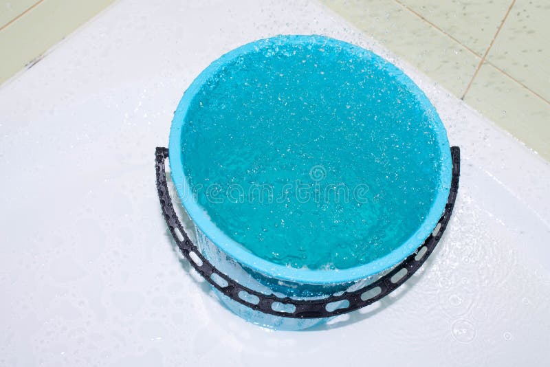 Blue Bucket Filled with Water Stock Photo - Image of plastic, drink ...