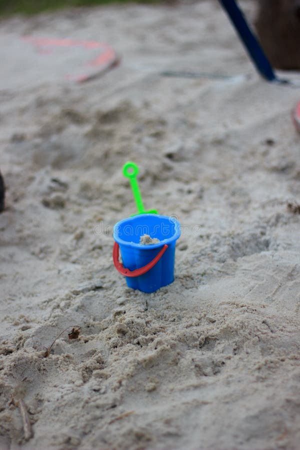 Toy bucket with sand stock photo. Image of sandbox, childhood - 14883650