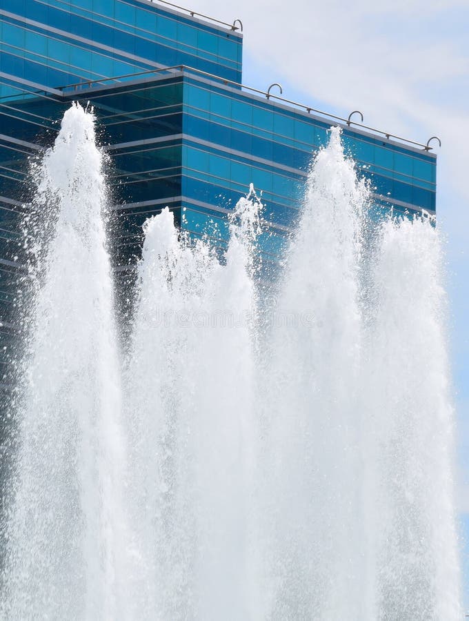 Blue Building, White Water stock image. Image of glass - 73784583