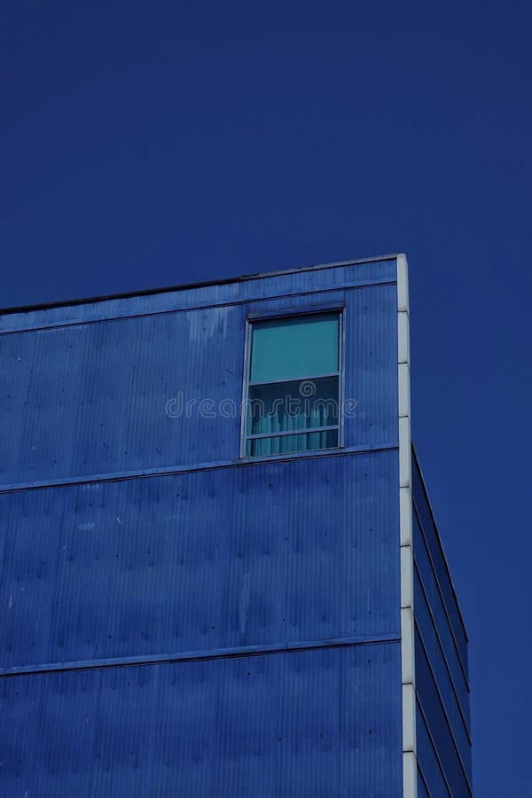 Blue Building and Window on a Blue Sky Background Stock Photo - Image ...