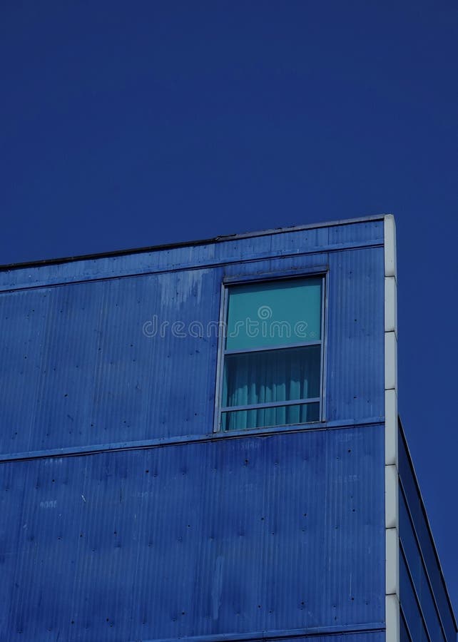 Blue Building and Window on a Blue Sky Background Stock Photo - Image ...