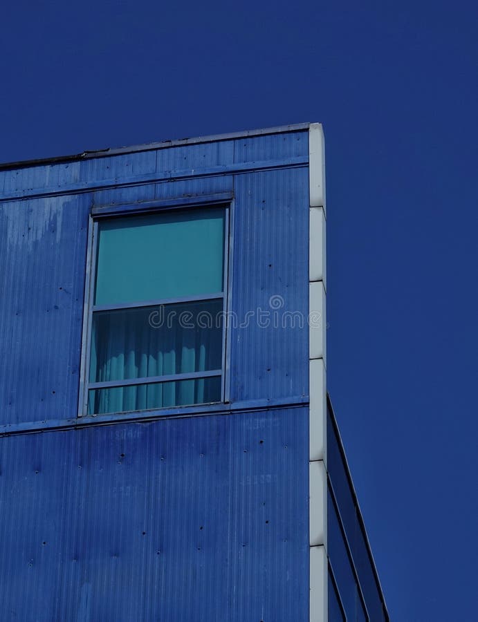 Blue Building and Window on a Blue Sky Background Stock Photo - Image ...