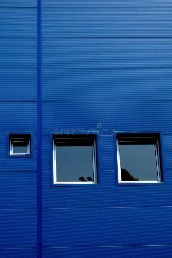 Blue building with windows stock image. Image of town - 109416993