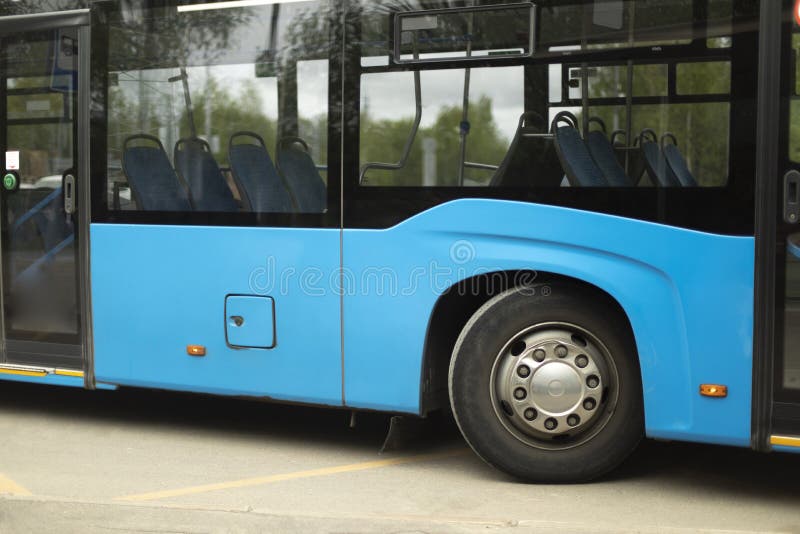Blue Bus. Public Transport at Bus Stop Stock Image - Image of snow ...