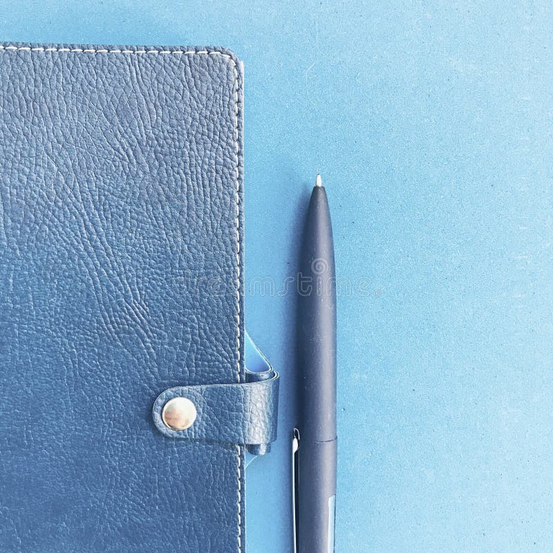 Blue Business Diary and Pen on a Blue Background. 2020 Color Trend ...