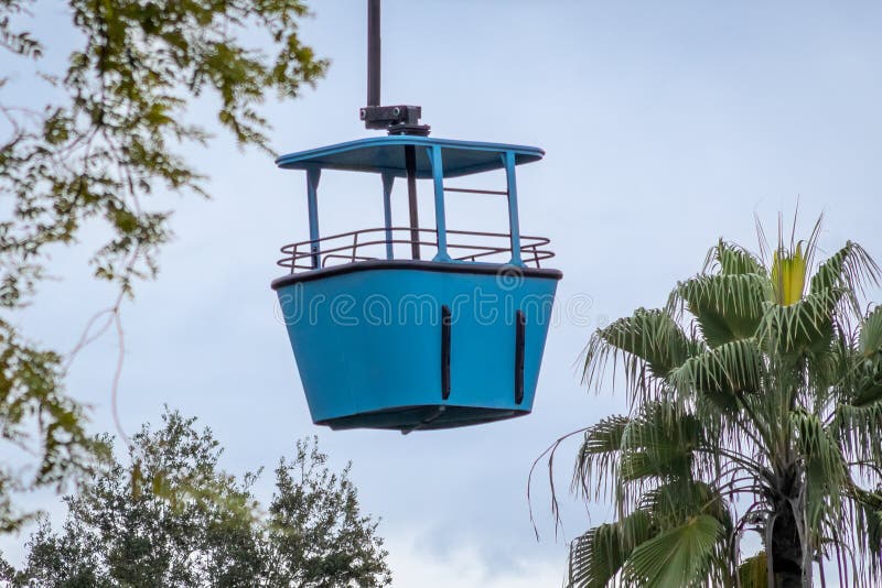 Blue Cable Car Amidst Palm Trees in the Sky Stock Photo - Image of ...