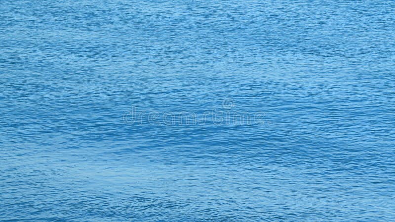 Blue Calm Sea. Blue Water Reflection. Flowing Water Surface. Still ...