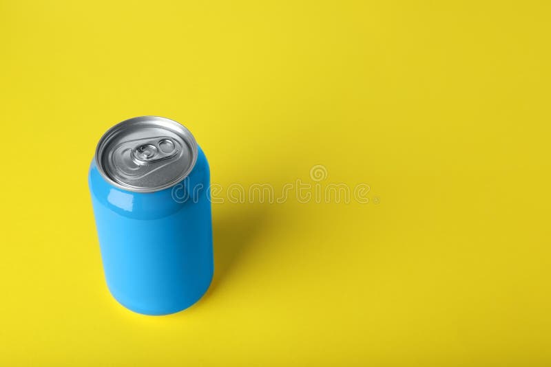 Blue Can of Energy Drink on Yellow Background. Space for Text Stock ...