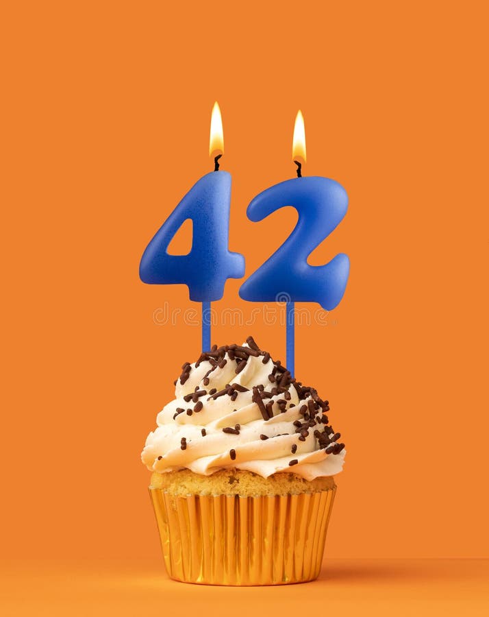 Blue Candle Number 42 - Birthday Cupcake on Orange Background Stock ...