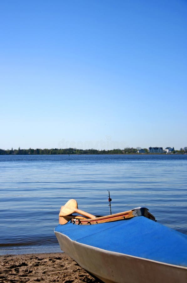 Blue Canoe On The Shore Picture. Image: 3705606