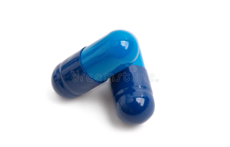 Blue capsules isolated stock photo. Image of object - 124989572